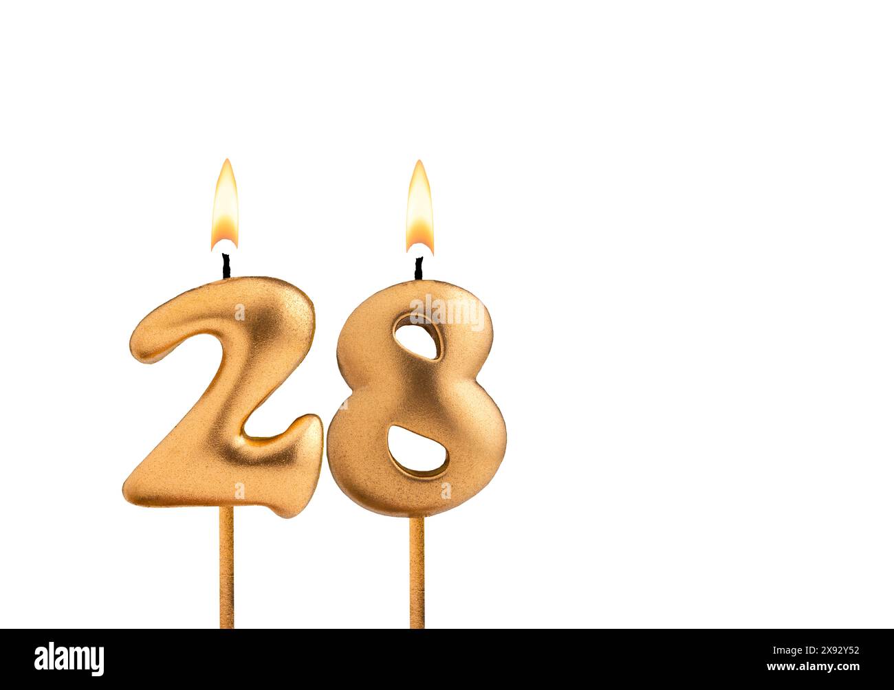 Birthday number 28 - Golden candle on white background Stock Photo - Alamy
