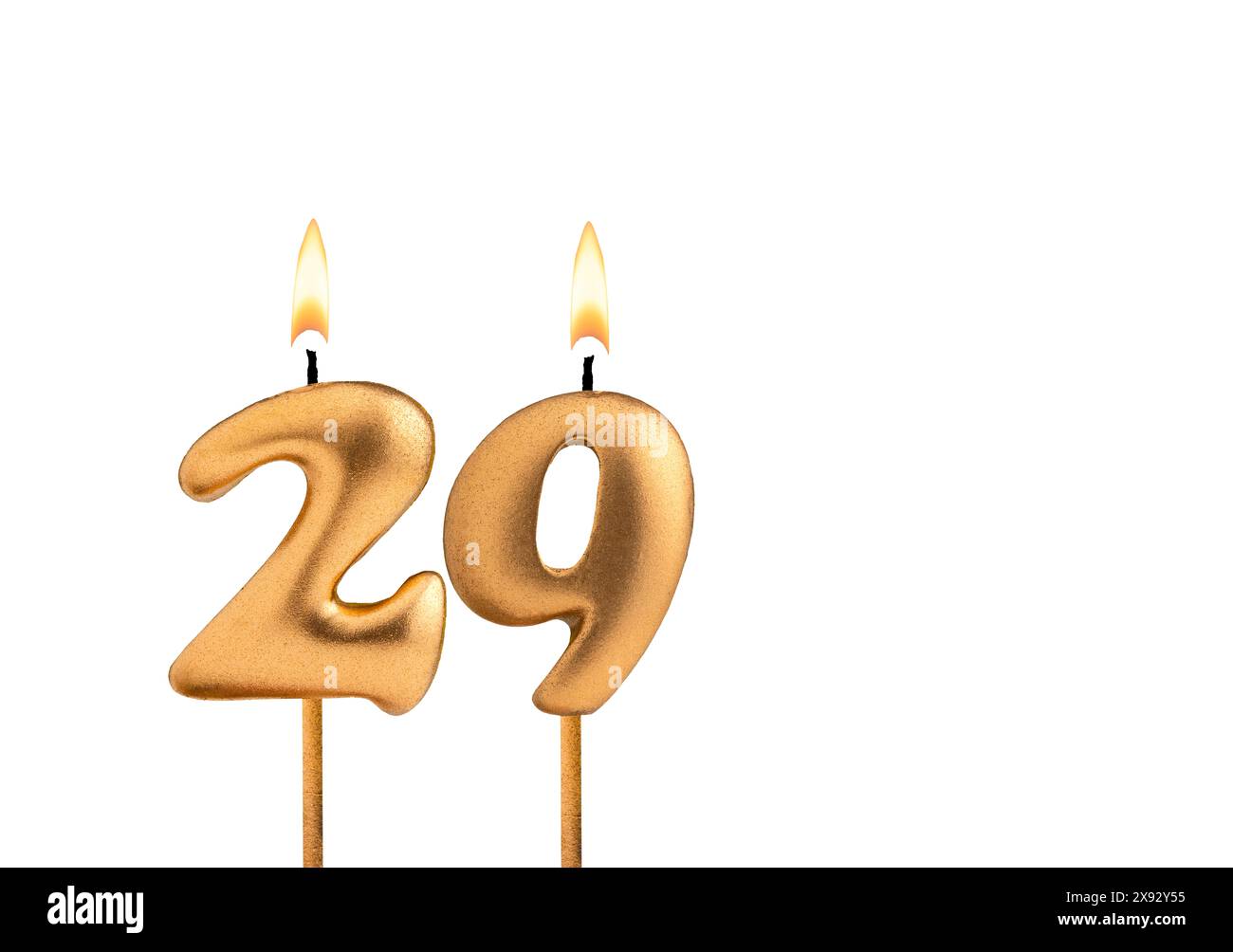 Golden candle number 29 - Birthday on white background Stock Photo - Alamy