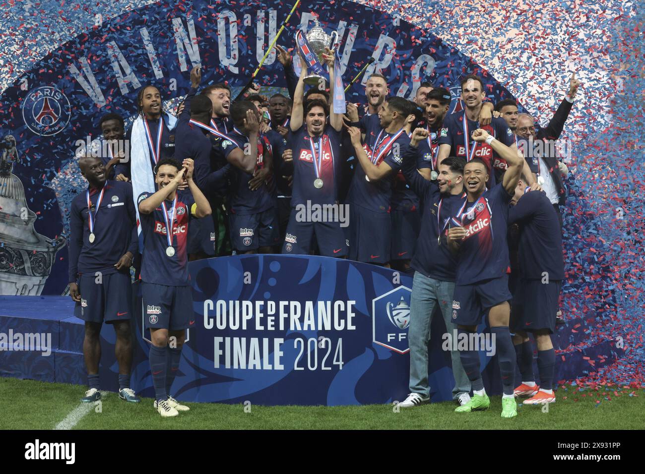 Vitinha of PSG holding the trophy, Kylian Mbappe and teammates ...