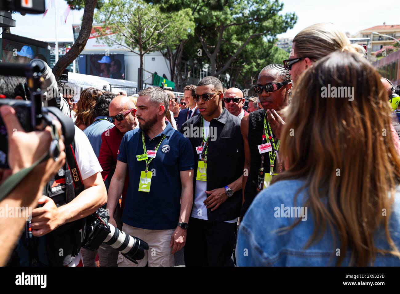 Footballer Kylian Mbappe on the starting grid during the Formula 1 ...