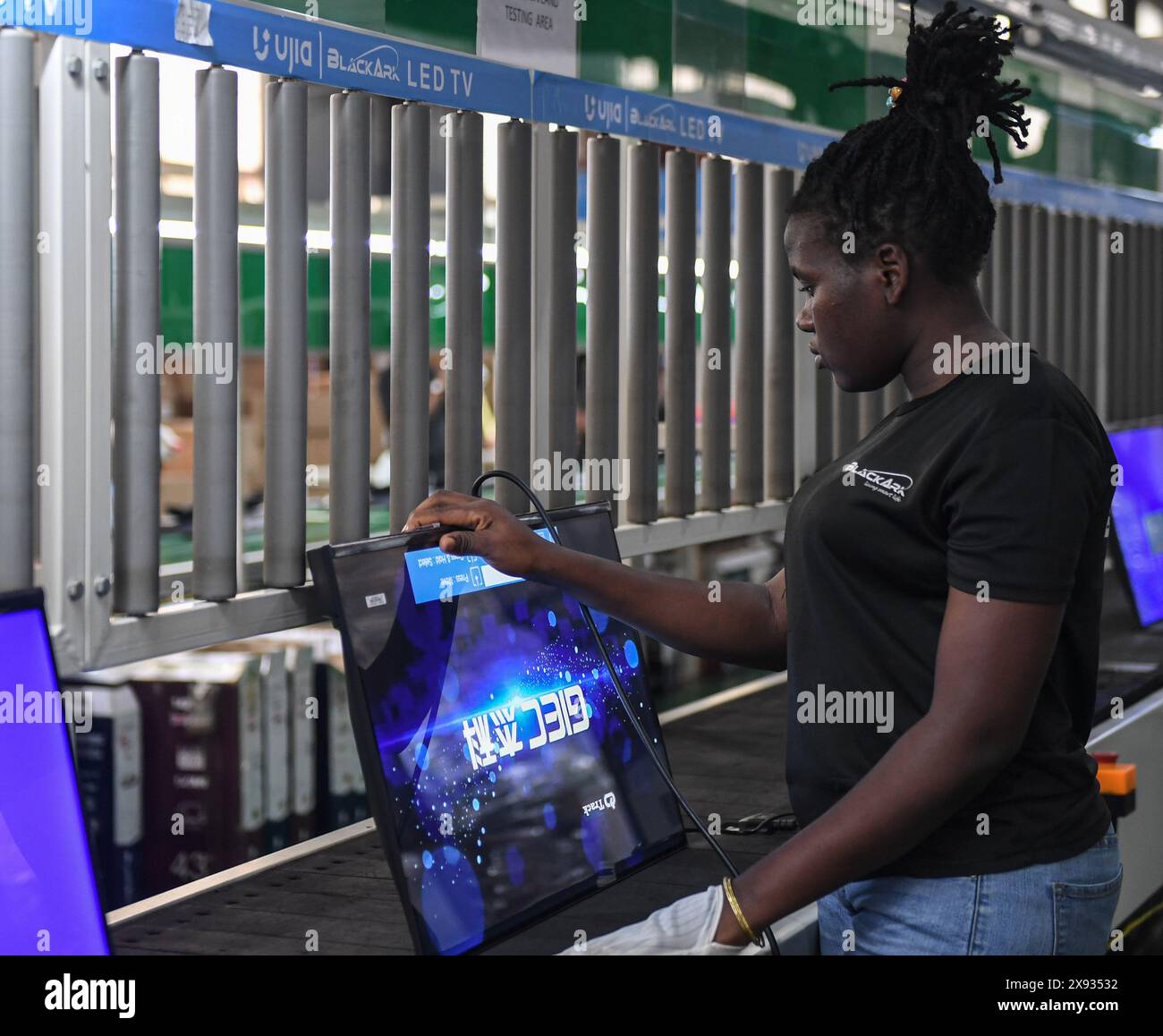 Mbale, Uganda. 28th May, 2024. A woman works at Ujia Innovation ...