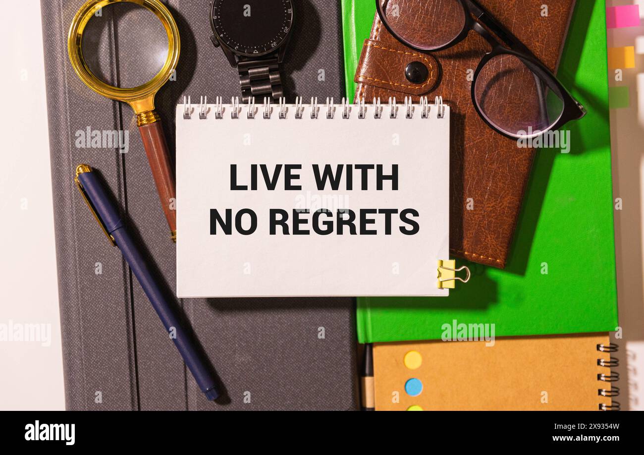 On blue background, torn paper with text written NO REGRET - to live a ...