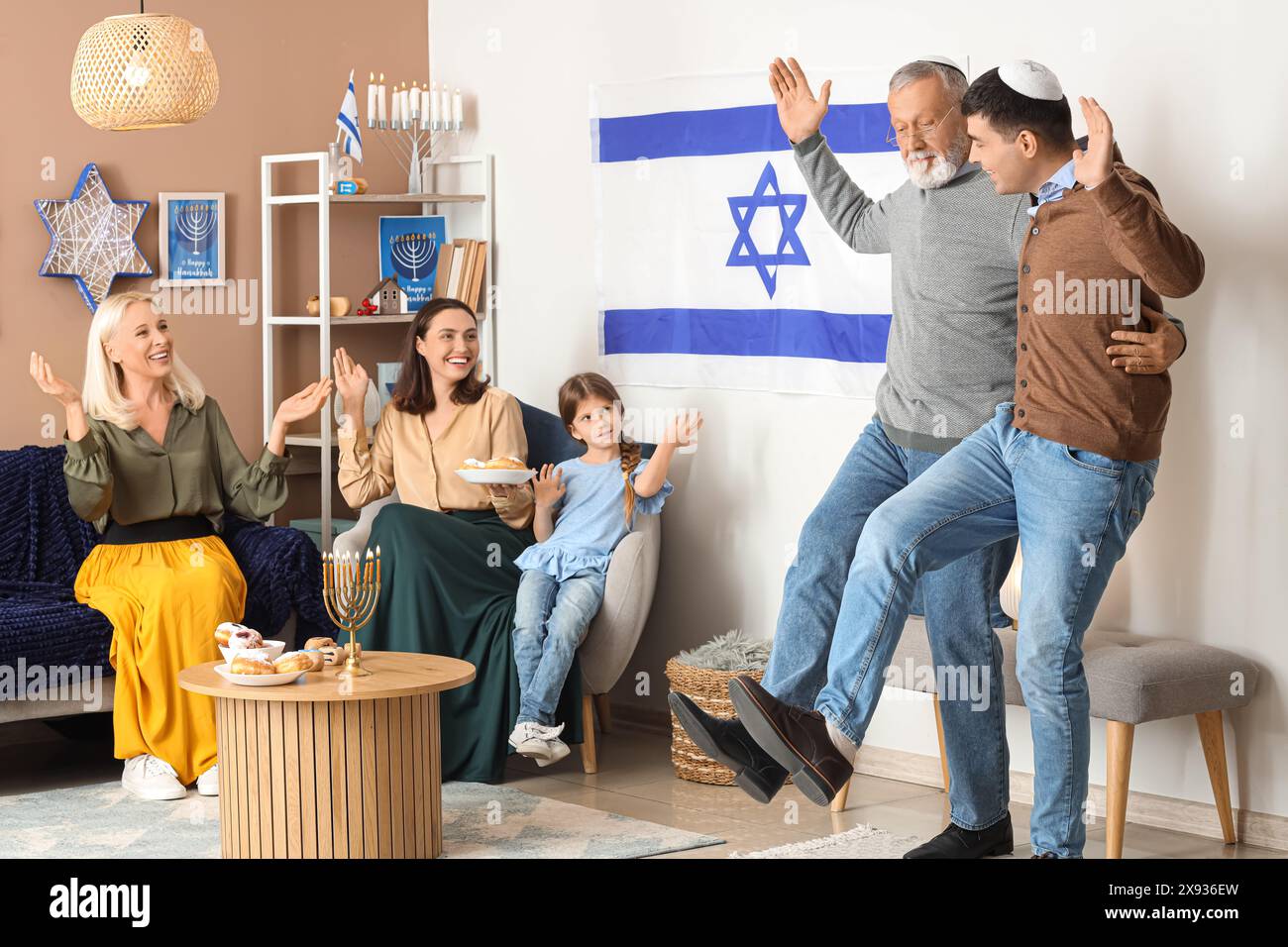 Happy Jewish family celebrating Hanukkah at home Stock Photo - Alamy