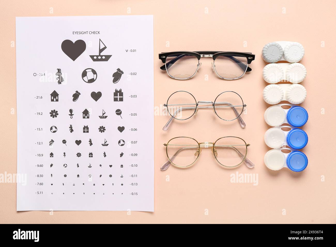 Stylish eyeglasses with eye test chart and containers for contact ...