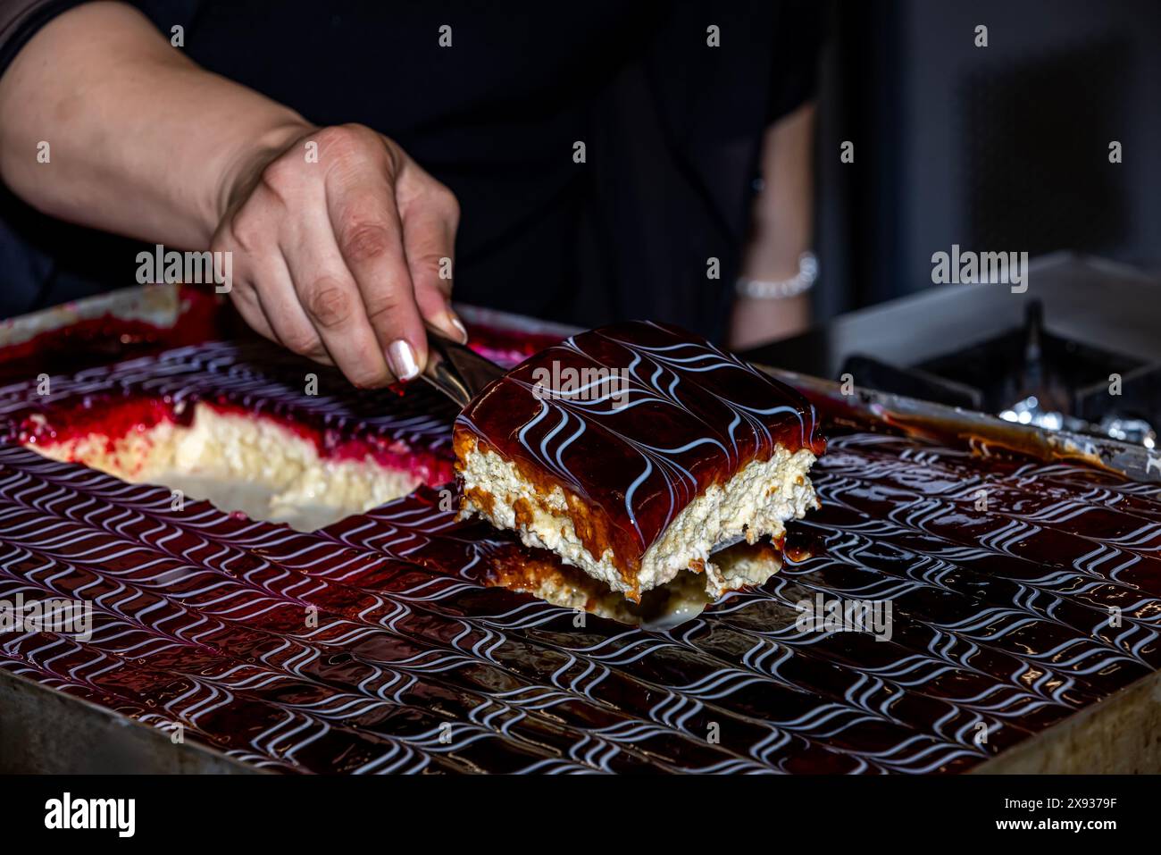 Chef prepares trilece dessert in the kitchen. Turkish Traditional ...
