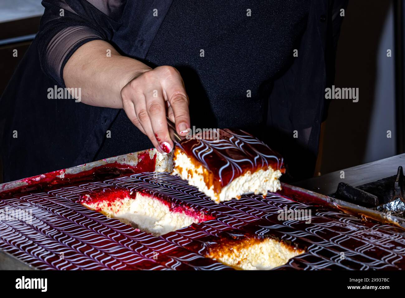 Chef prepares trilece dessert in the kitchen. Turkish Traditional ...
