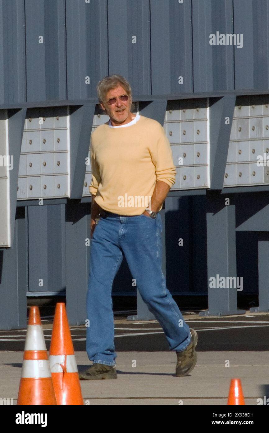 Exclusive. Harrison Ford left for the Labor Day weekend with his wife ...