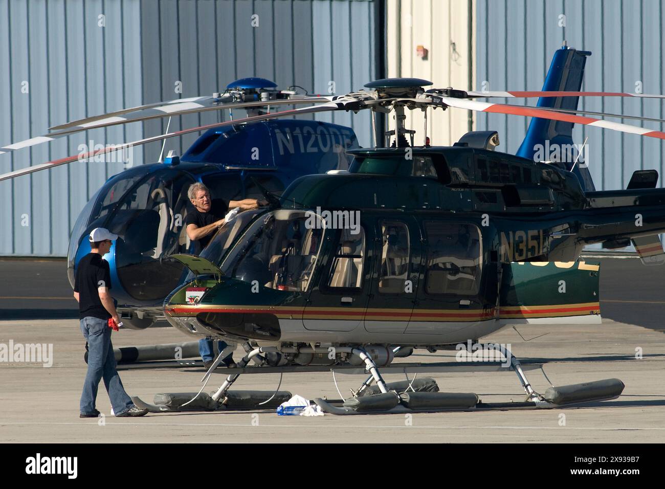 EXCLUSIVE-- Harrison Ford check and clean the windows of his helicopter ...