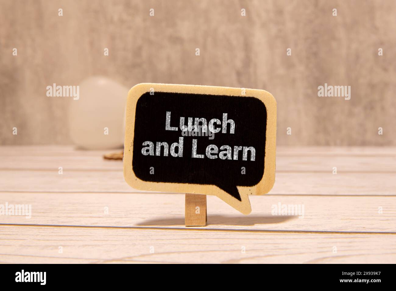 Hand writing the text: Lunch and Learn Stock Photo - Alamy