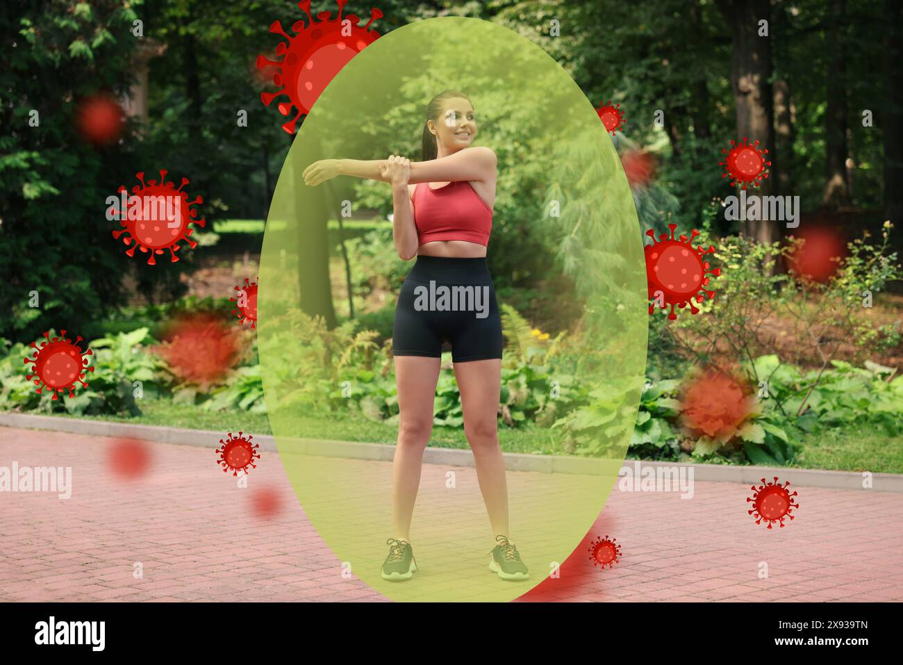Woman with strong immunity doing exercise outdoors. Bubble around her ...