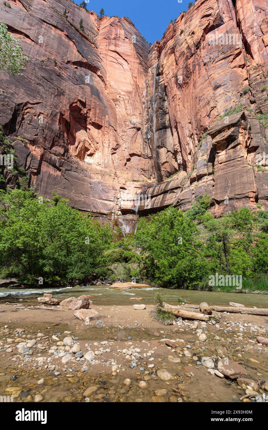 Light flow at the Temple of Sinawava waterfall into the Virgin River in ...