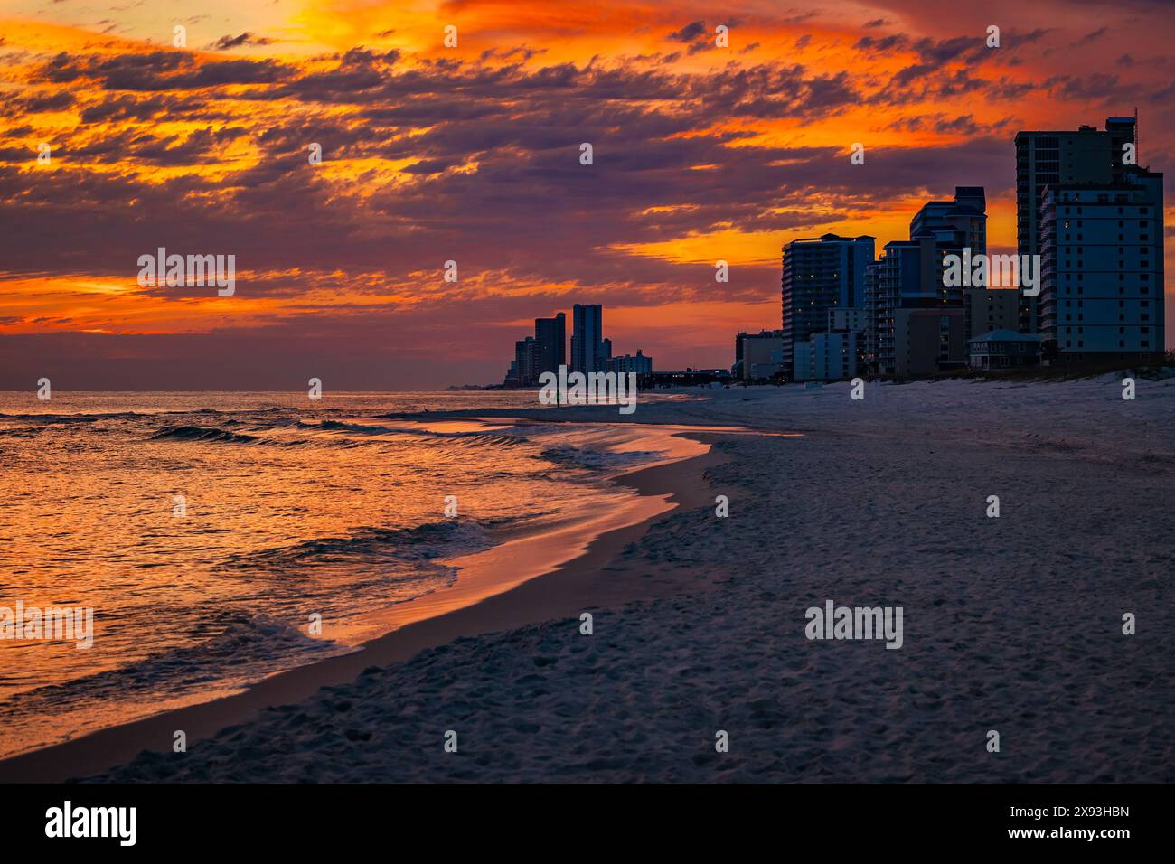 Hotels and condominium buildings along the shoreline of the beach at ...