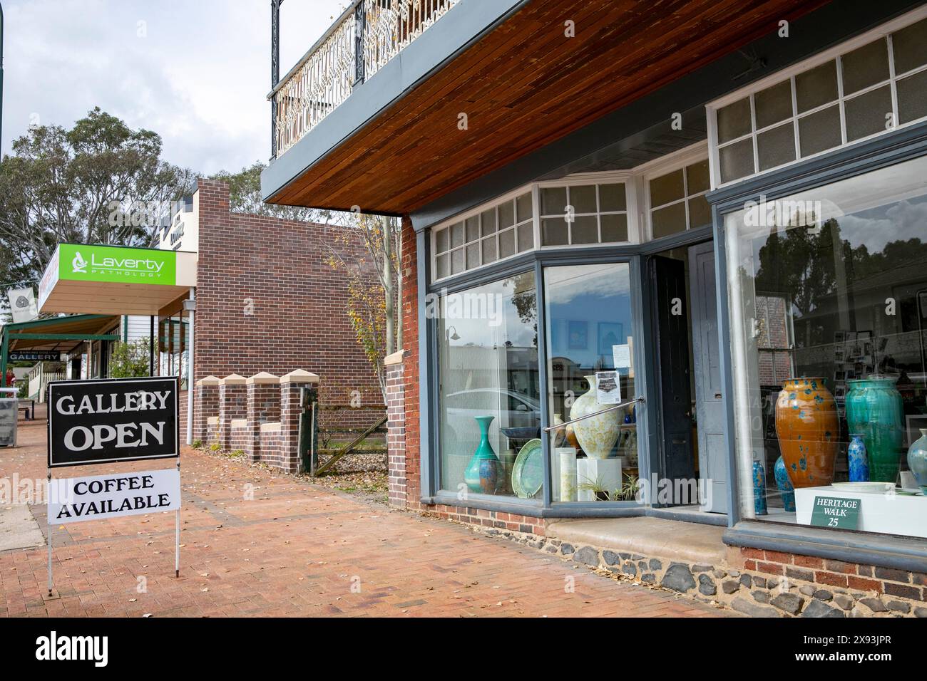 Uralla town centre in regional New South Wales, local art gallery and sculpture store with ...