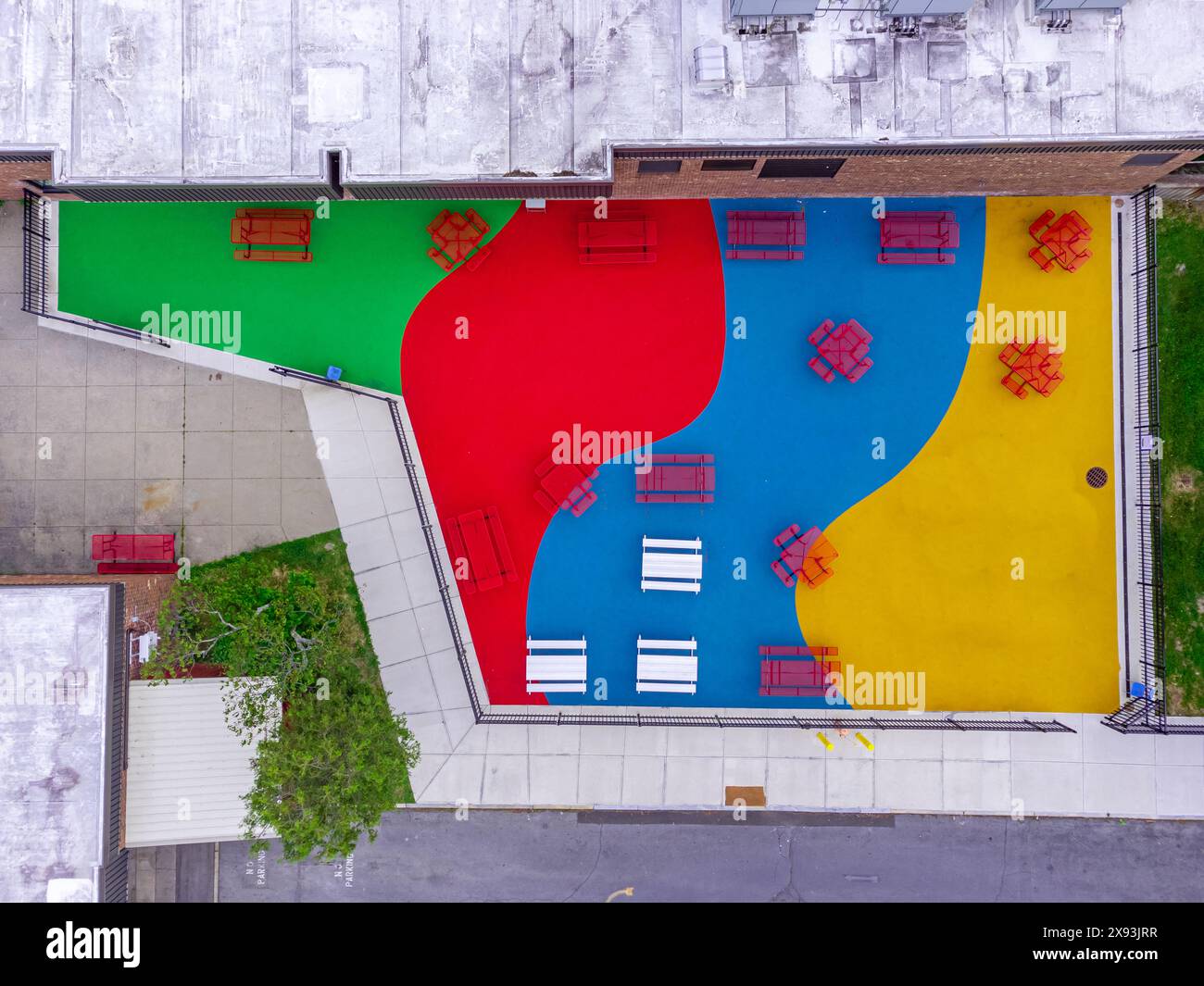 Aerial, drone, photo, of a red vinyl coated picnic tables on a multi ...