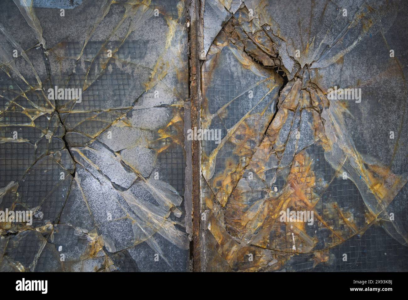 Broken Glass Window With Rusted Metal Grate Stock Photo - Alamy