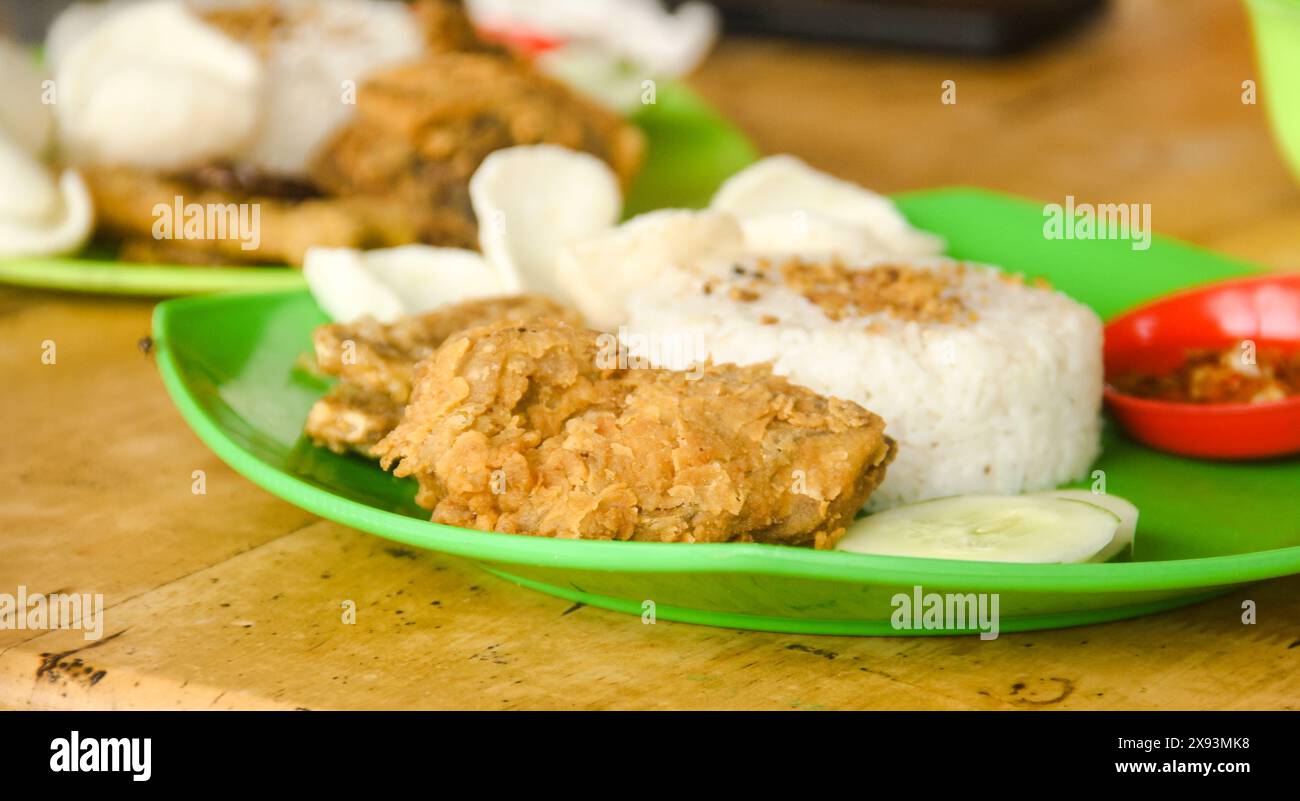 Ayam Geprek or chicken crush is a typical Indonesian food that is much ...