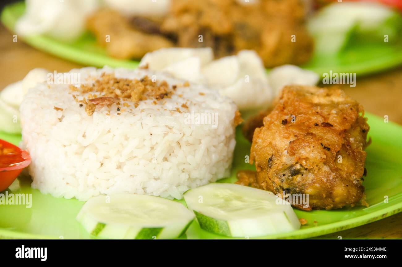 Ayam Geprek or chicken crush is a typical Indonesian food that is much ...