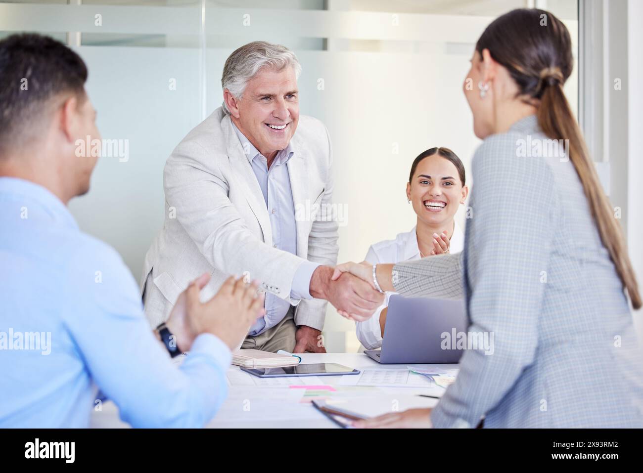 Meeting, handshake and teamwork for sales deal, success and b2b collaboration. Boardroom ...