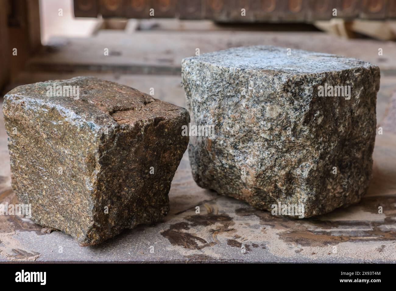 Mittweida, Germany. 28th May, 2024. A used granite paving stone and its ...