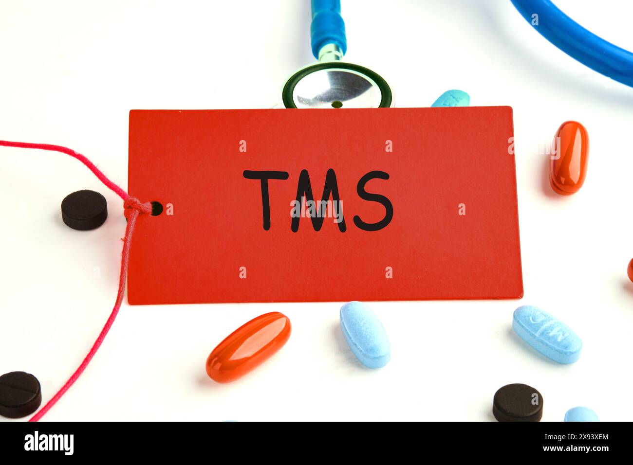The acronym TMS transportation management system. Written on a red card ...