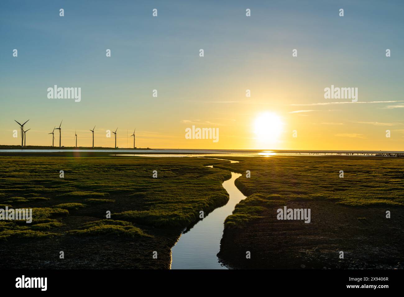 Gaomei Wetlands Area wind turbines in sunset time, a popular scenic ...