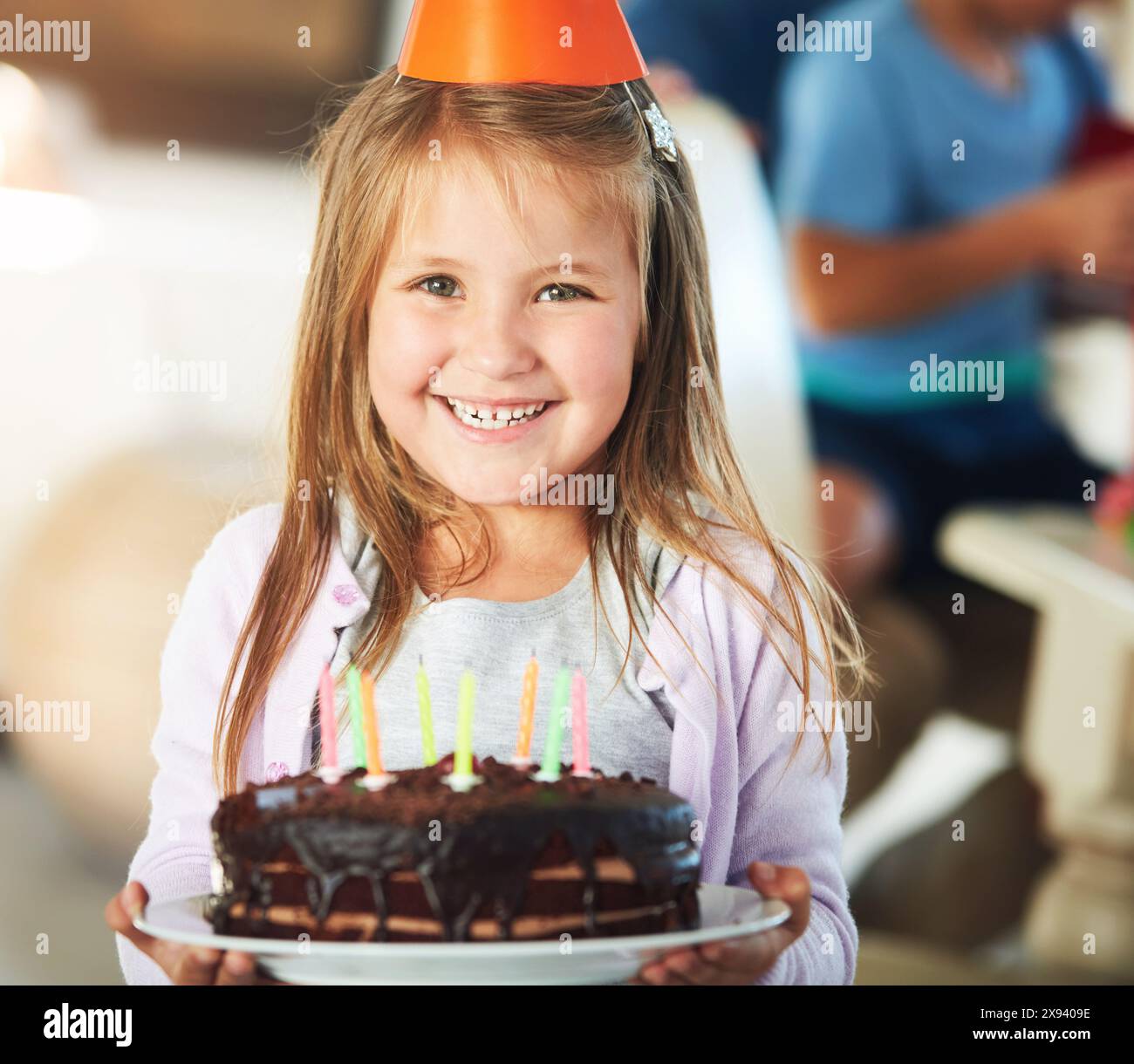 Happy, portrait and girl child with birthday cake, smile and hat in ...