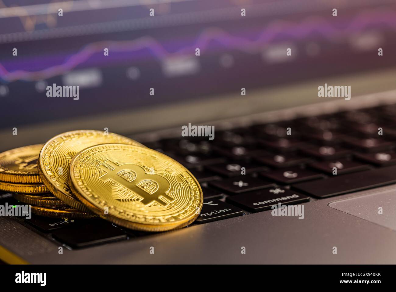 Bitcoin gold coin. Cryptocurrency on computer a keyboard and business ...