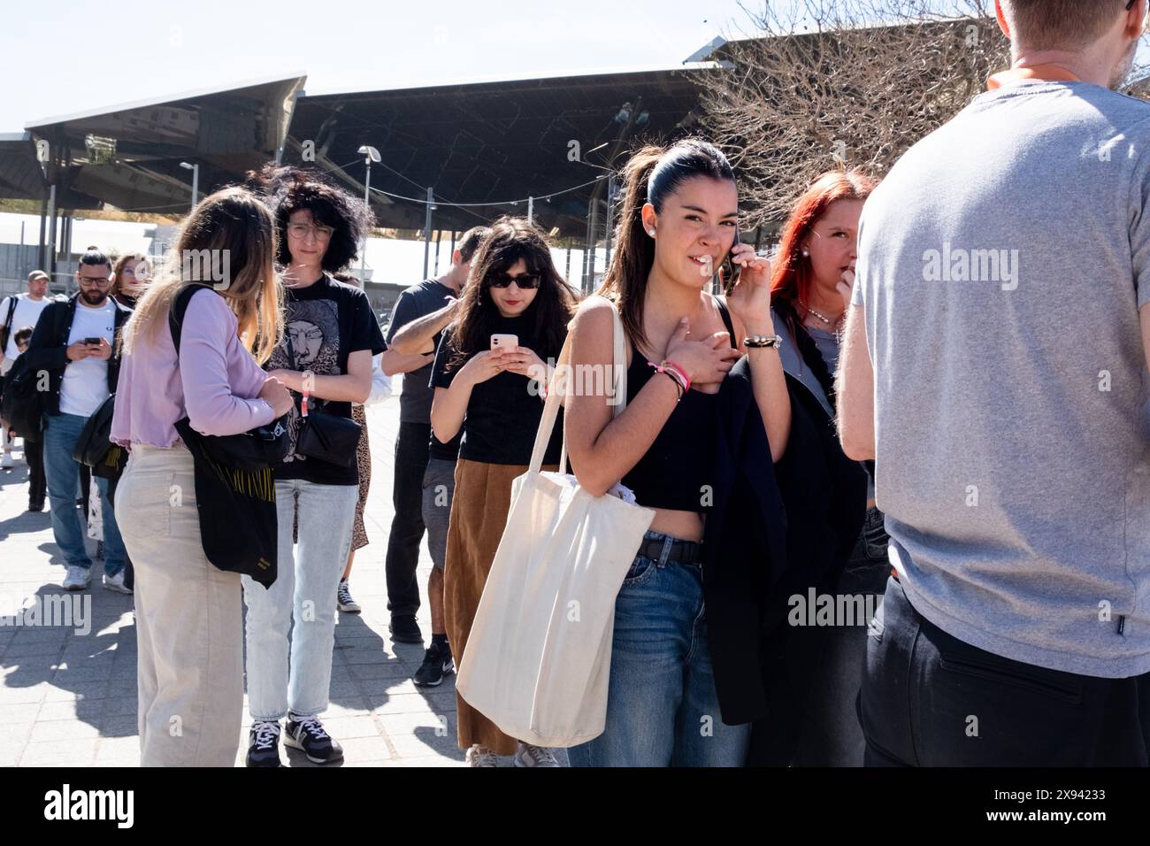 Attendees queue for a popular talk at the Open Room at OFFF Barcelona ...