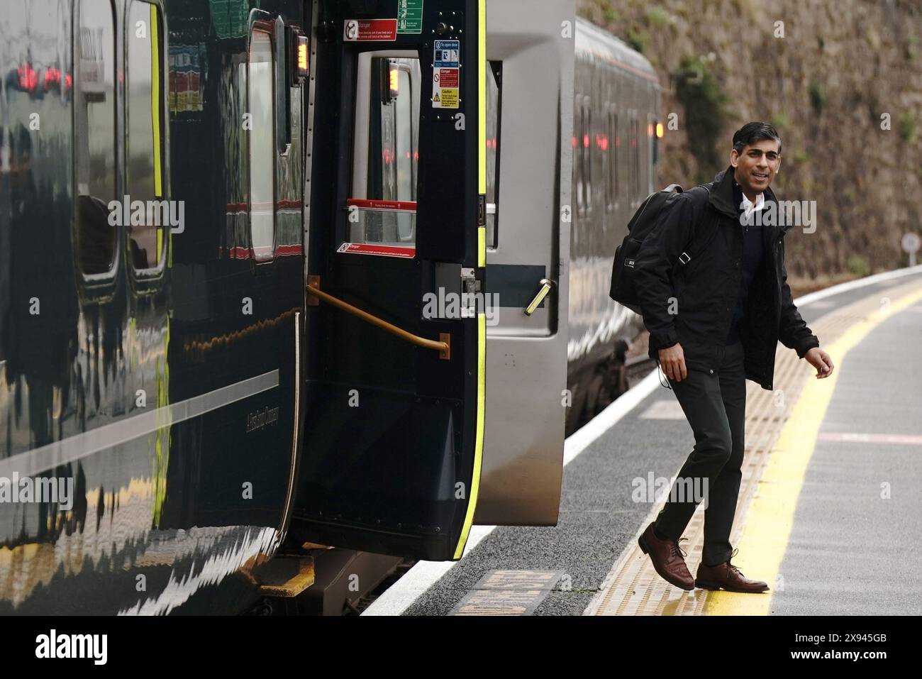 Prime Minister Rishi Sunak arrives at a train station in Cornwall on ...