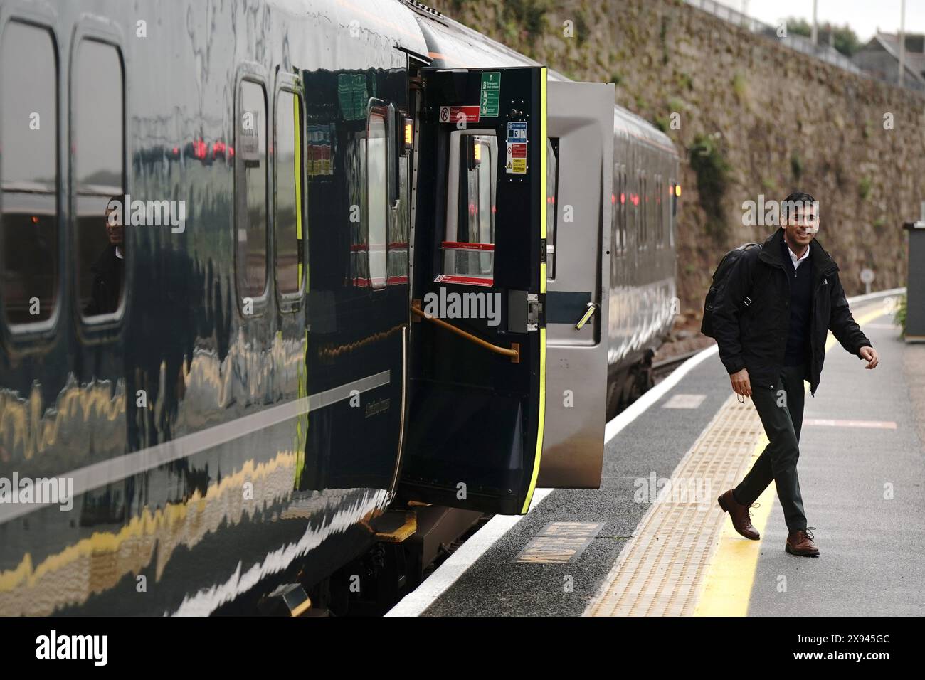 Prime Minister Rishi Sunak arrives at a train station in Cornwall on ...
