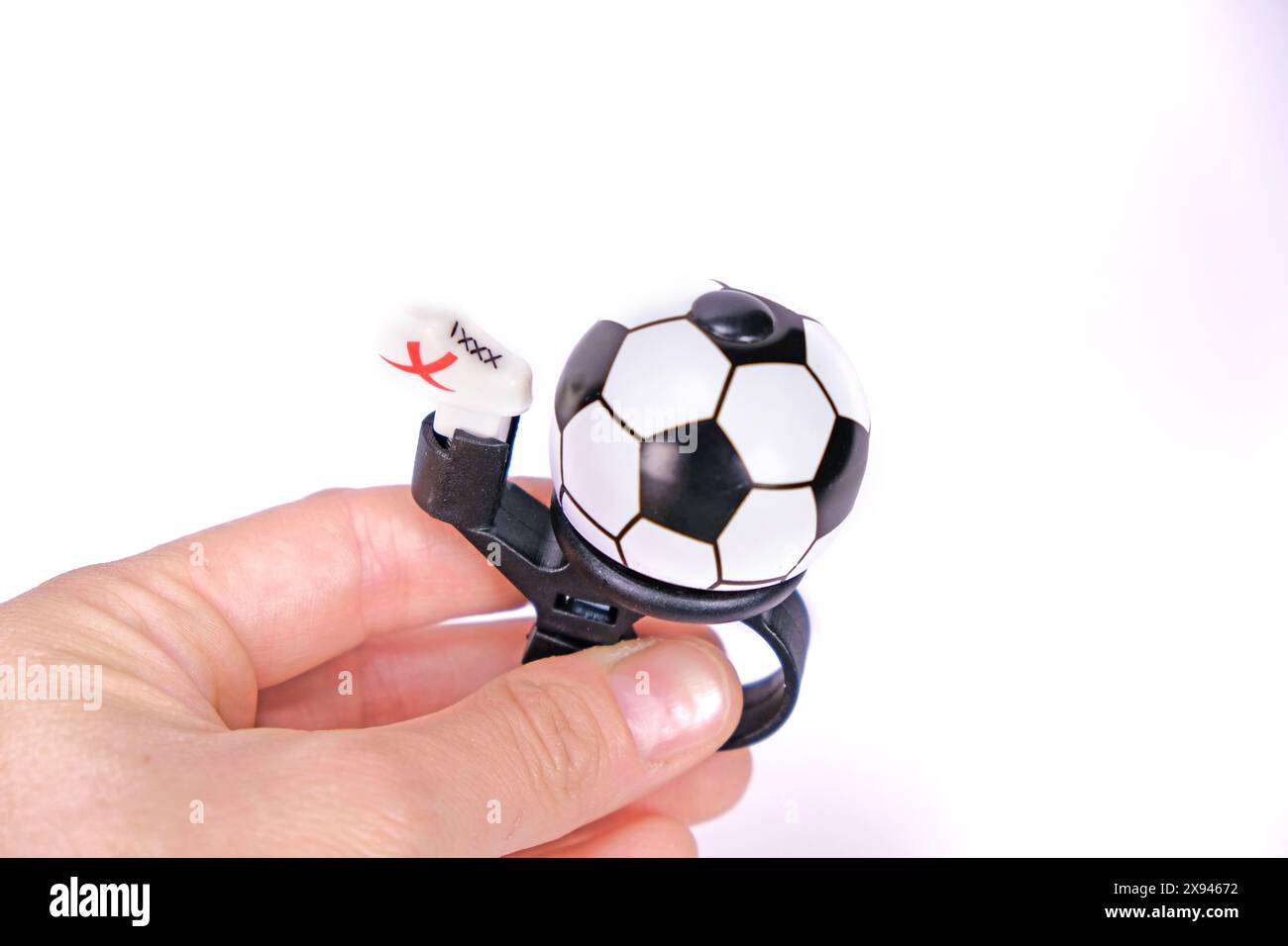 Football bell for bicycle Stock Photo - Alamy