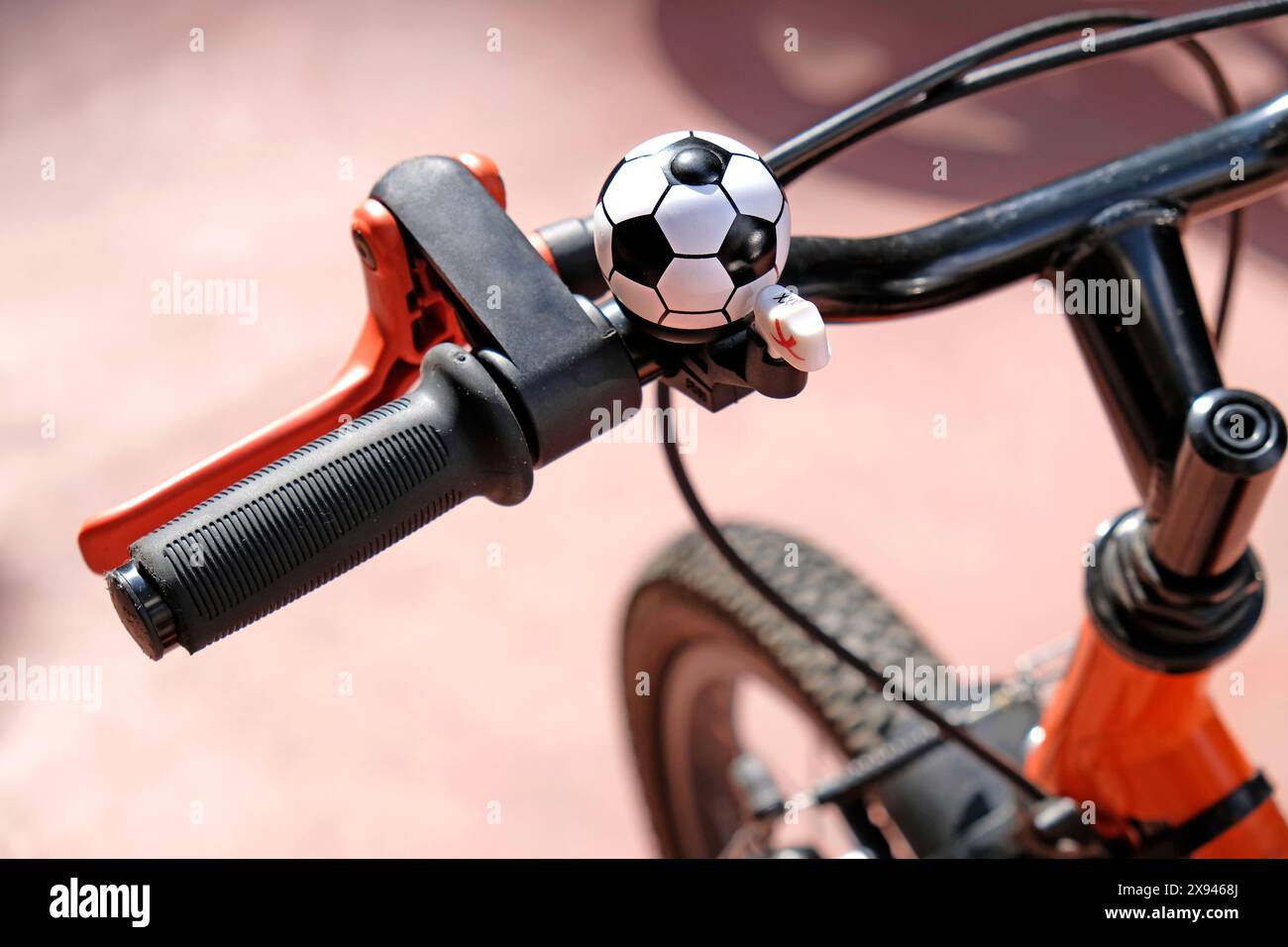 Football bell on the handle Stock Photo - Alamy