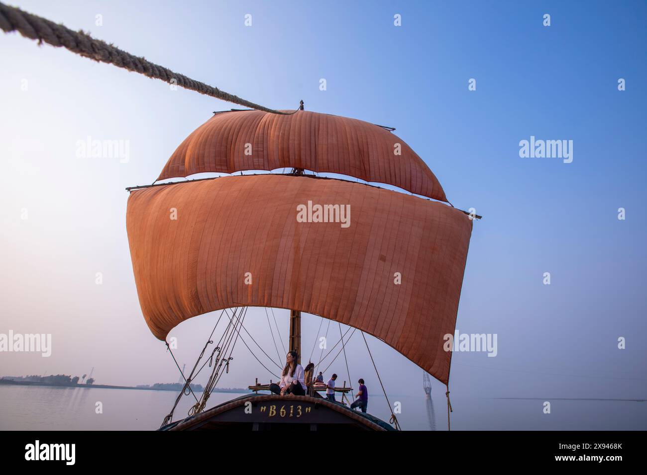 A traditional sailing wooden boat on the Jamuna River, Manikganj ...
