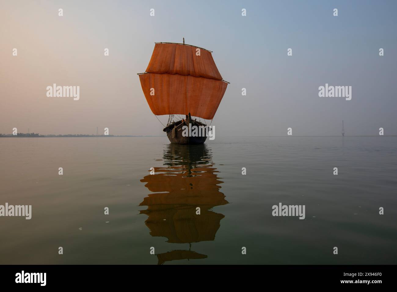 A traditional sailing wooden boat on the Jamuna River, Manikganj ...