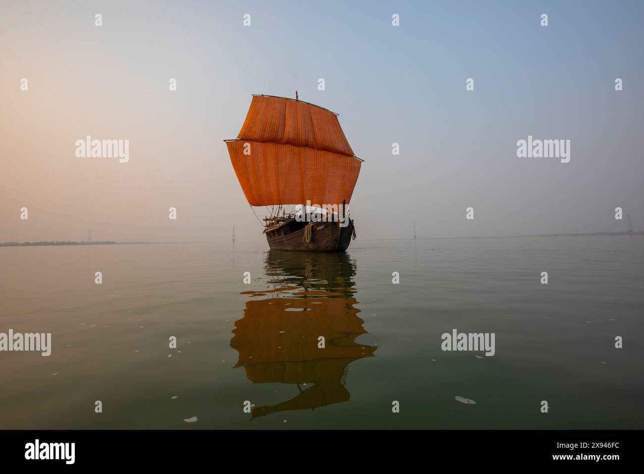 A traditional sailing wooden boat on the Jamuna River, Manikganj ...
