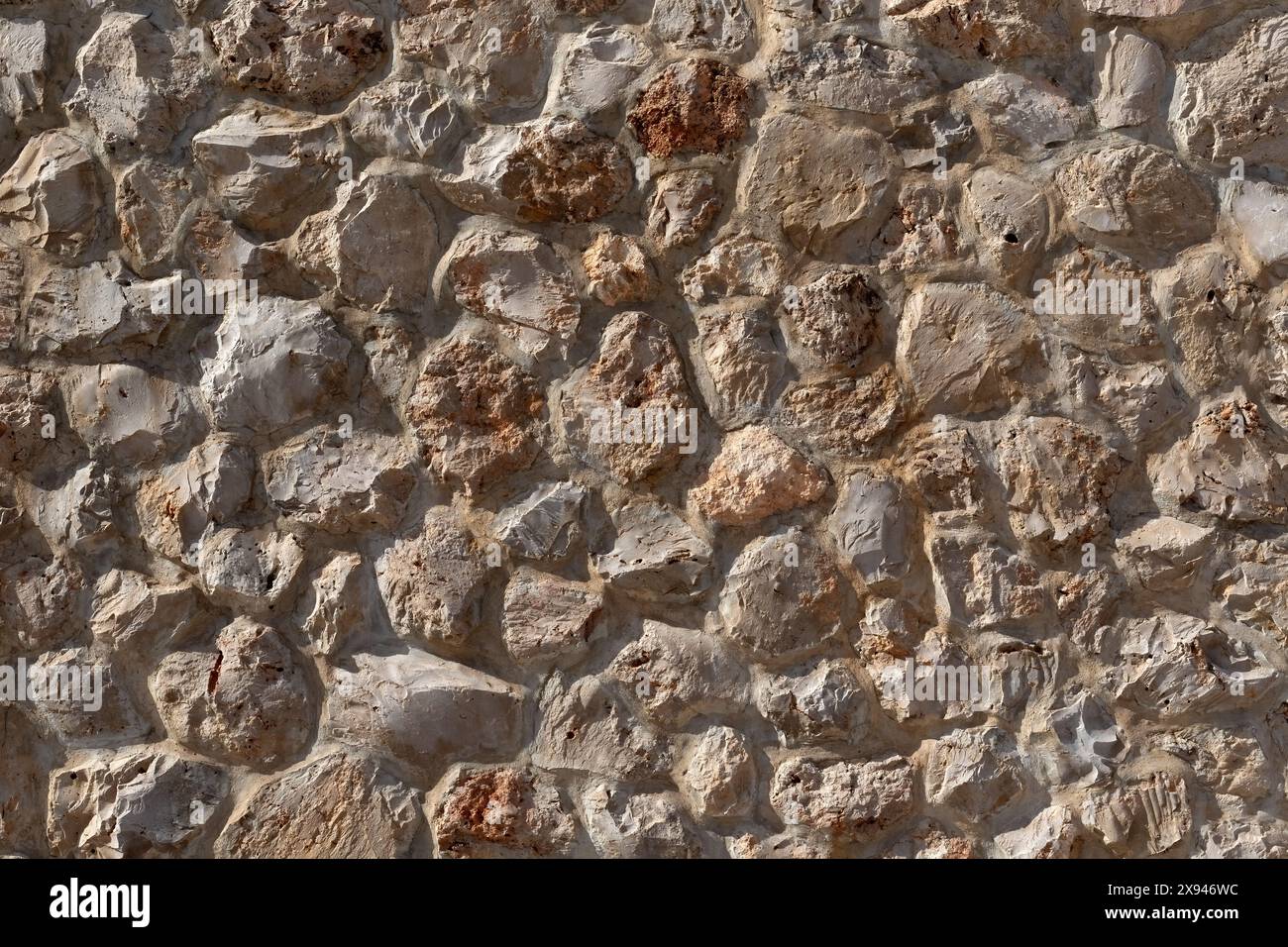 Background texture of cream coloured stone wall Stock Photo - Alamy