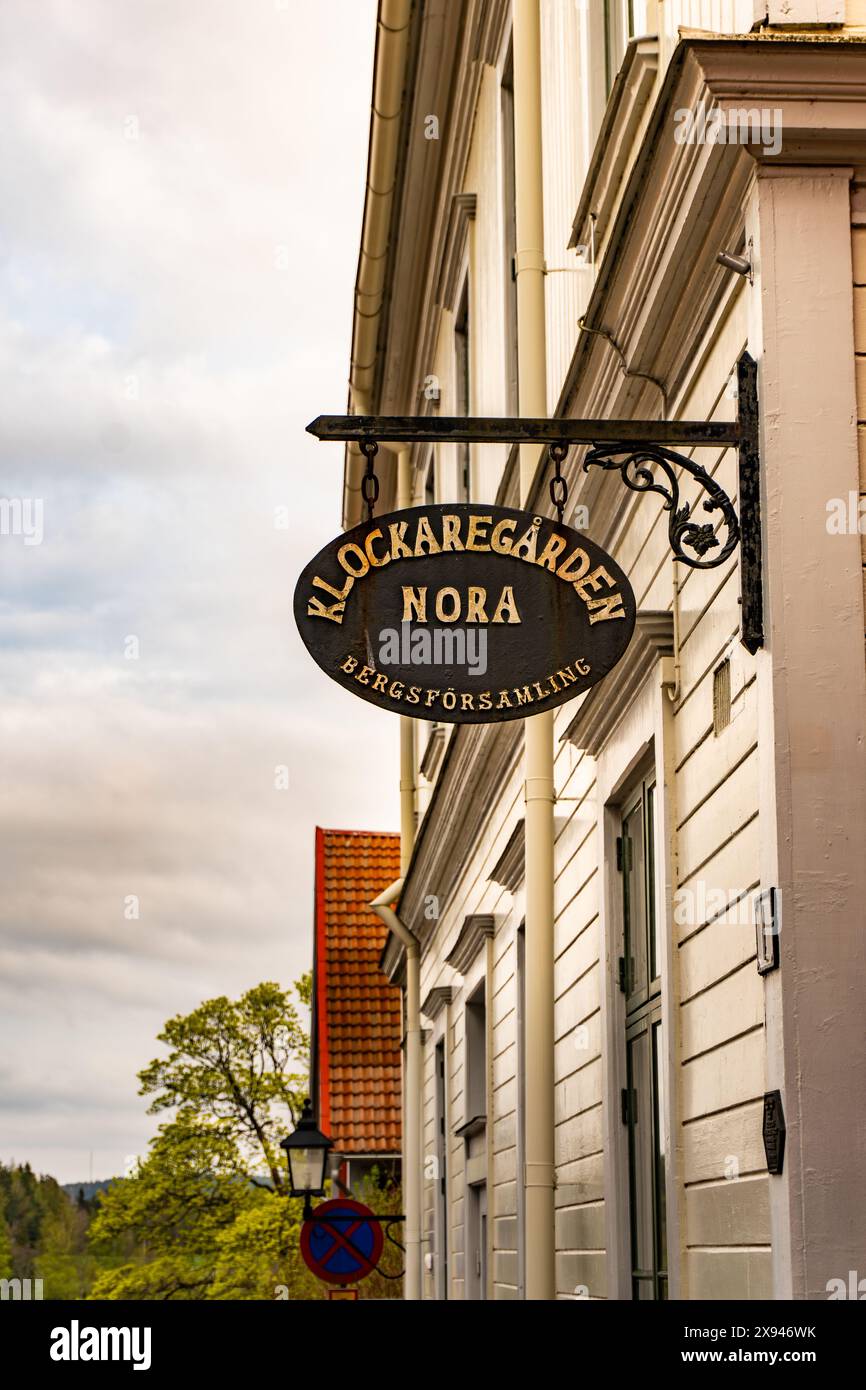 Old-fashioned street sign in a quaint village, capturing the charm and ...