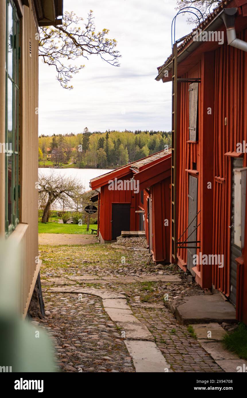 Traditional wooden house in a village setting, highlighting the quaint ...