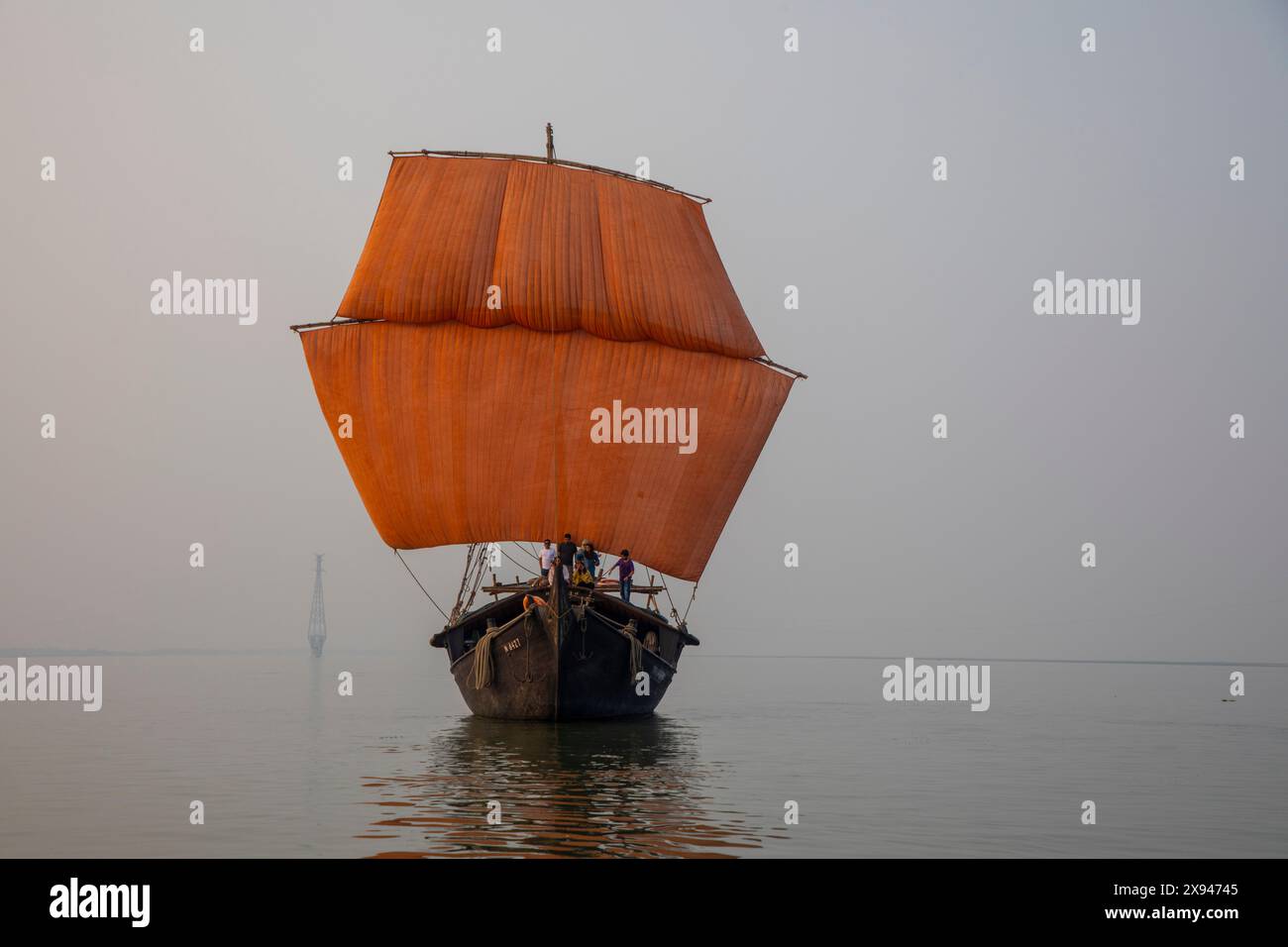 A traditional sailing wooden boat on the Jamuna River, Manikganj ...