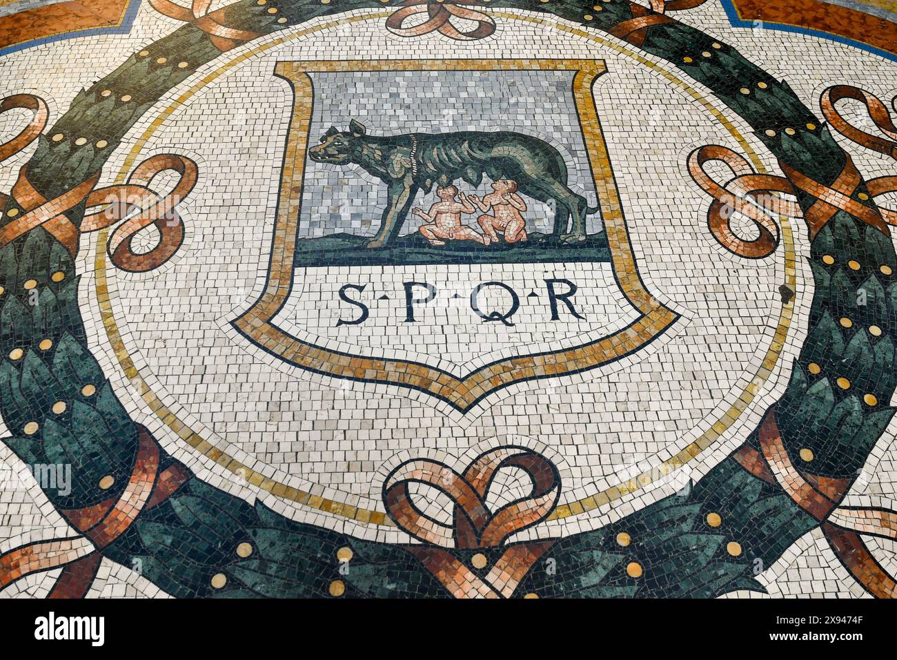 Mosaic floor in the Galleria Vittorio Emanuele II depicting the coat of arms of Rome with the ...