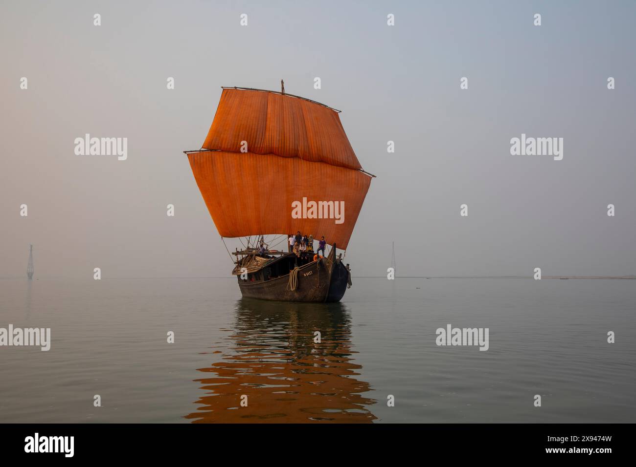 A traditional sailing wooden boat on the Jamuna River, Manikganj ...