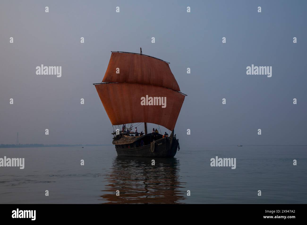 A traditional sailing wooden boat on the Jamuna River, Manikganj ...