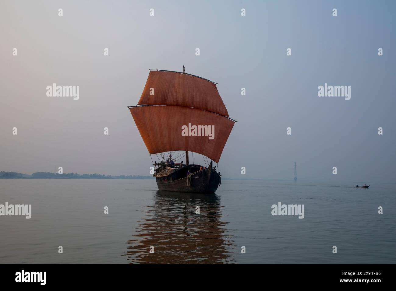 A traditional sailing wooden boat on the Jamuna River, Manikganj ...