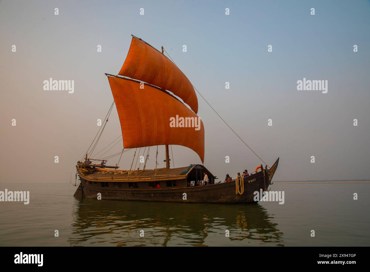 A traditional sailing wooden boat on the Jamuna River, Manikganj ...