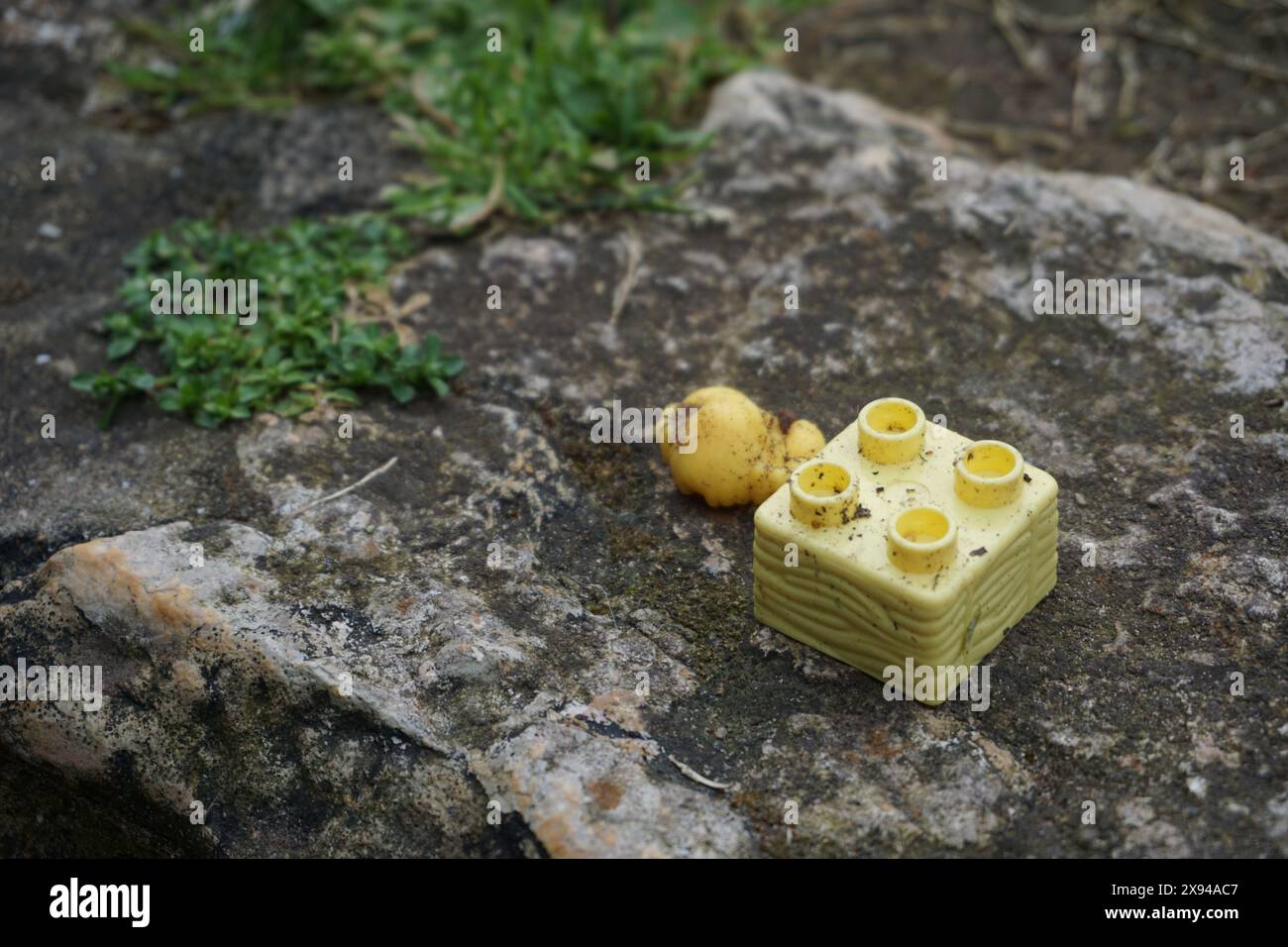 Lego Piece on the ground Stock Photo - Alamy