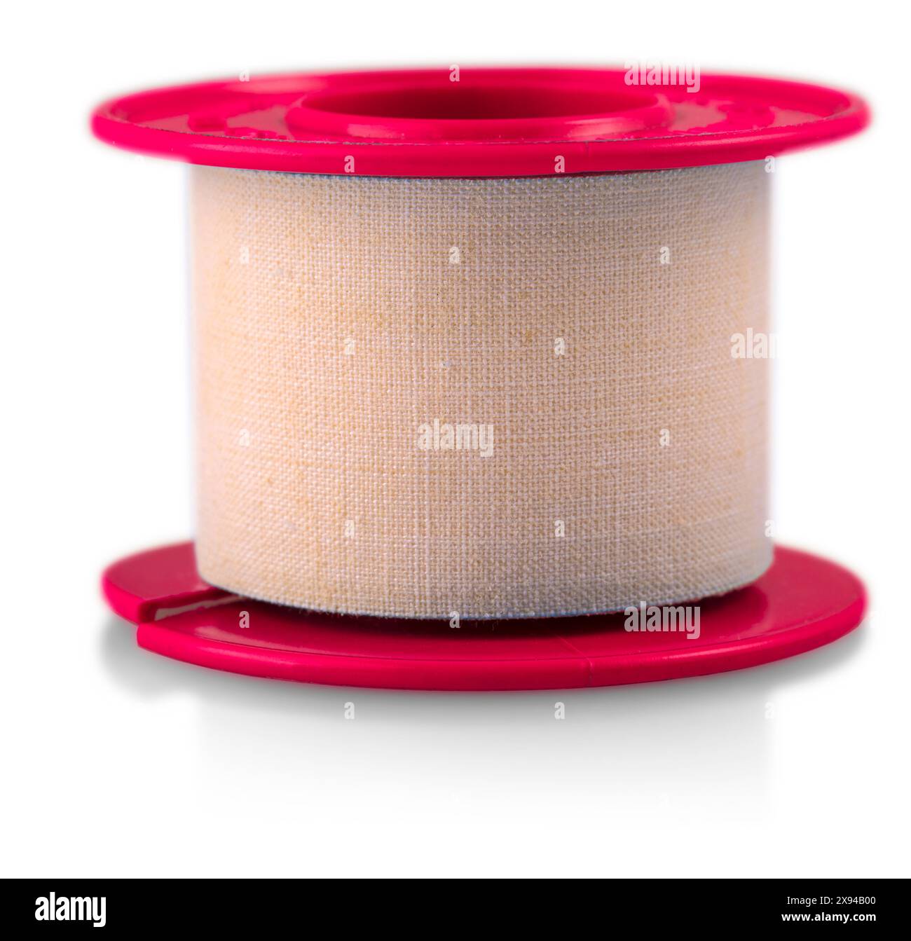 The Roll of medical sticking plaster isolated on white Stock Photo - Alamy