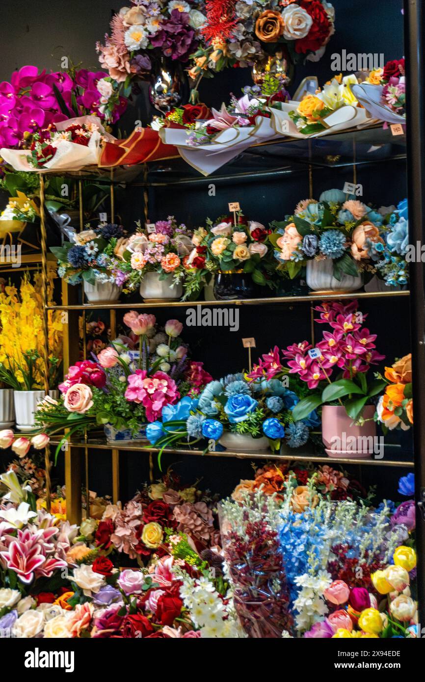 Decor flower in flower shop. View of ornamental plants, flower pot ...