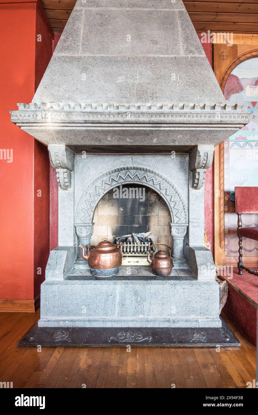Two superb, old copper kettles on a magnificent fireplace at the ...
