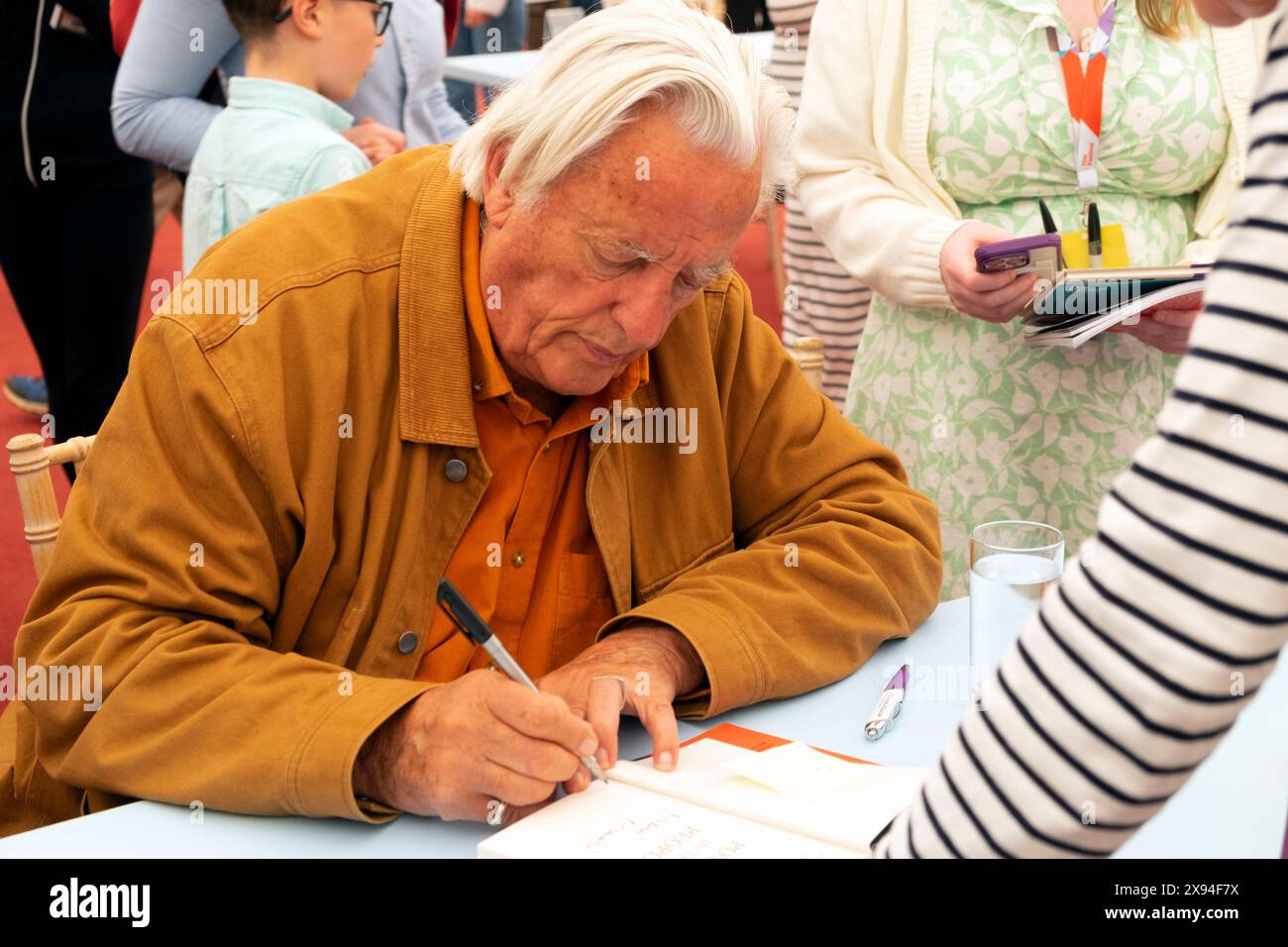 British human rights barrister author Michael Mansfield KC signing ...