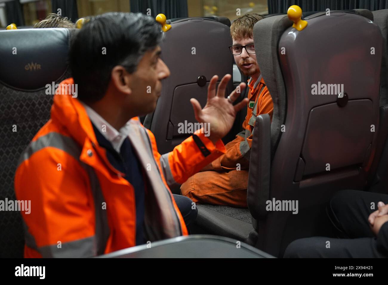 Prime Minister Rishi Sunak talks to an apprentice during his visit to ...